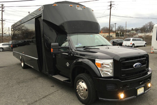 Executive Black Limo Bus - Ritz Limousines